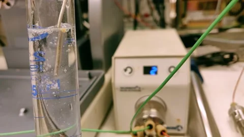 Nitrogen bubble through organic solvent ... | Stock Video | Pond5