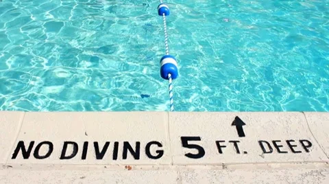 No diving sign - 5 feet deep next to poo... | Stock Video | Pond5
