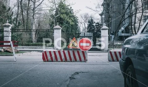 No entry sign on the road. traffic sign no entry. barrier at the road ...