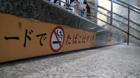 No smoking sign on the stairs of a subwa... | Stock Video | Pond5