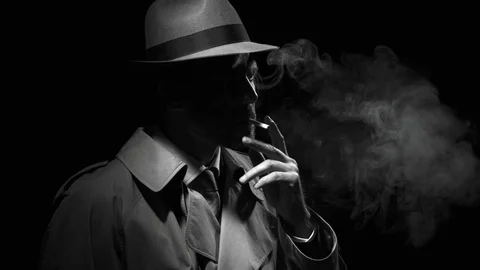 Noir detective smoking a cigarette in th... | Stock Video | Pond5