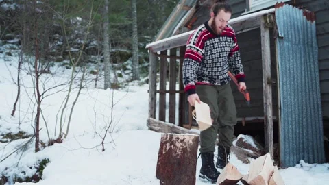 Norwegian Guy Is Cutting Log Using Axe D... | Stock Video | Pond5