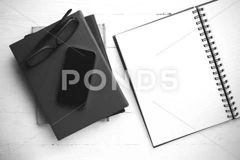 Notepad with stack of book black and white tone color style Stock Photo ...