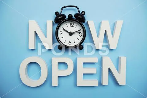 Now Open alphabet letters on blue background Stock Photo #202635775