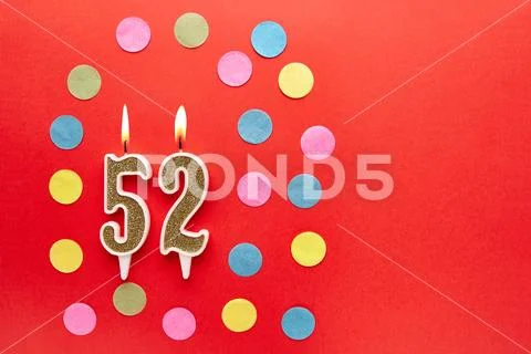 Number 52 on a red background with colored confetti. Happy birthday ...