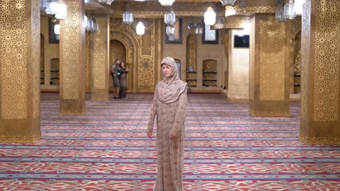 Nun in Robe Stands Inside an Islamic Mos... | Stock Video | Pond5