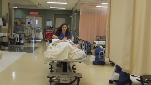 Nurse and Doctor rush a critical patient... | Stock Video | Pond5