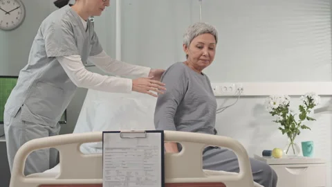 Nurse Taking Care of Patient in Hospital... | Stock Video | Pond5