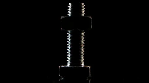 Nut to middle wound on bolt rotates on b... | Stock Video | Pond5