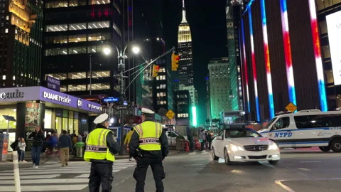 NYPD officers stand dramatically in fron... | Stock Video | Pond5