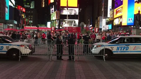 NYPD police guarding crowd in times squa... | Stock Video | Pond5