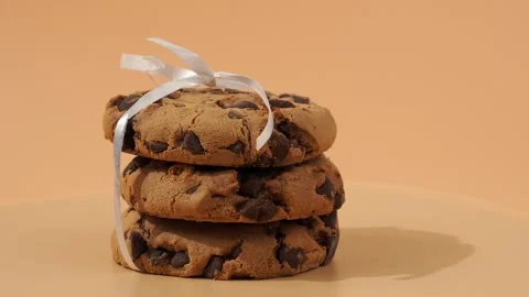 Oatmeal chocolate chip cookies rotate on... | Stock Video | Pond5