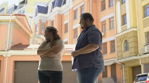 Obese male hugging shy girlfriend, trust... | Stock Video | Pond5