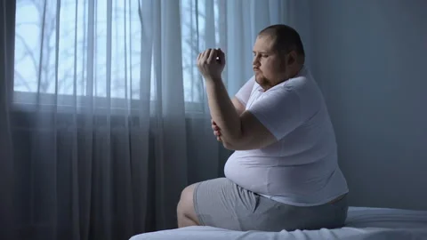 Obese man suffering from elbow pain, joi... | Stock Video | Pond5