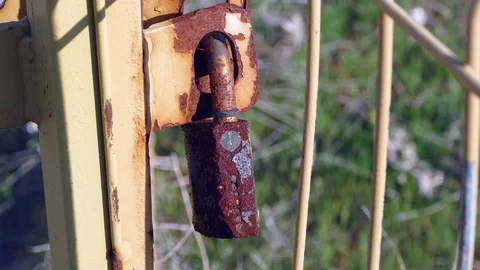 obsolete rusted door lock, garden gate l... | Stock Video | Pond5
