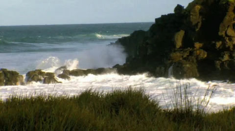 Ocean Waves Crash into Cliff causing Sea... | Stock Video | Pond5