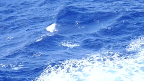 Ocean waves with mist on wave peaks | Stock Video | Pond5