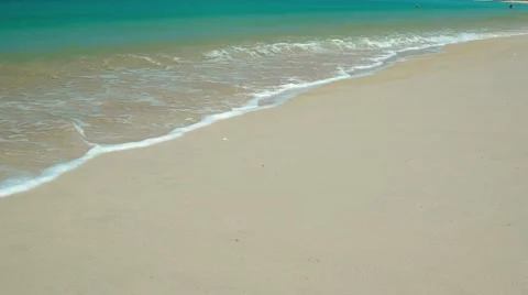 Ocean Waves Wash a Pristine Tropical Bea... | Stock Video | Pond5