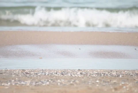 ocean waves washing beach sand. | Stock Video | Pond5