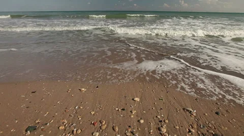 ocean waves washing beach wide lens | Stock Video | Pond5