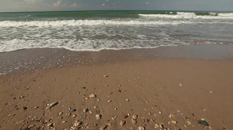 ocean waves washing beach wide lens | Stock Video | Pond5