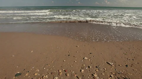 ocean waves washing beach wide lens | Stock Video | Pond5