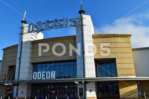 Odeon cinema exterior on sunny day, UK ~ Premium Photo #146264029