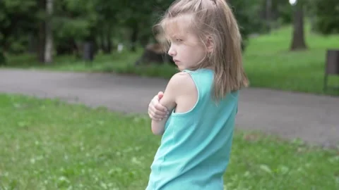 Offended and upset little girl on a walk... | Stock Video | Pond5