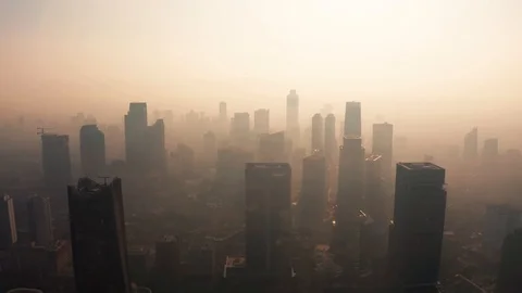 Office buildings with air pollution at d... | Stock Video | Pond5