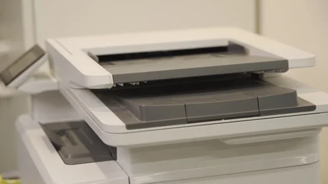 Office printer is working, printing on w... | Stock Video | Pond5