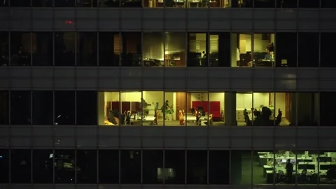 Office worker leaving work late at night... | Stock Video | Pond5