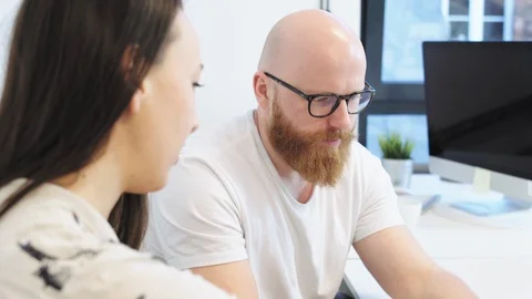 Office workers examining files | Stock Video | Pond5