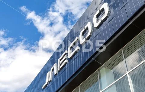 Official dealership sign of Jaecoo on the wall of the office building ...