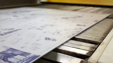 Offset plate moves at feeding line of pr... | Stock Video | Pond5