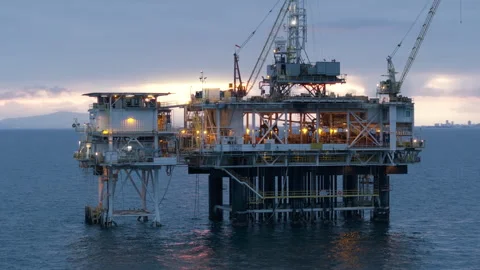 Offshore oil drilling rig and lots of sh... | Stock Video | Pond5