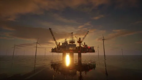 Offshore Oil Rig and Wind Turbines at Su... | Stock Video | Pond5