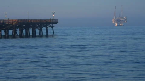 Oil rig platform off of Seal Beach Pier ... | Stock Video | Pond5