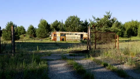 Old abandoned radioactive bus in Chernob... | Stock Video | Pond5