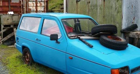 An old abandoned Reliant Robin on a crof... | Stock Video | Pond5