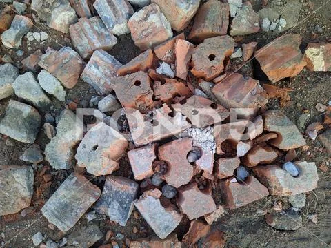 Old and broken bricks in pieces on the ground top view Stock Image ...