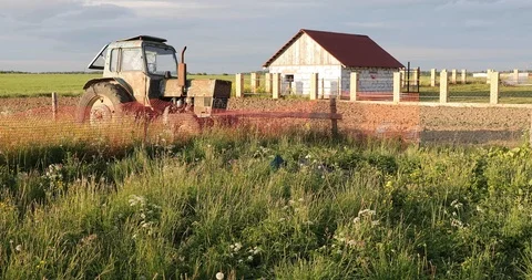 old and rusty farm machine in the field ... | Stock Video | Pond5