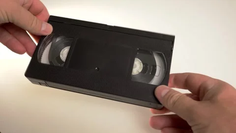 An old and worn-out VHS cassette in the ... | Stock Video | Pond5