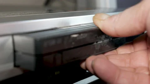 Old appliances, loading a video tape in... | Stock Video | Pond5