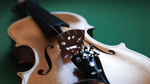 An old beige violin from behind. Dolly s... | Stock Video | Pond5