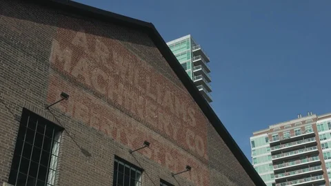 Old brick building with condos in the ba... | Stock Video | Pond5