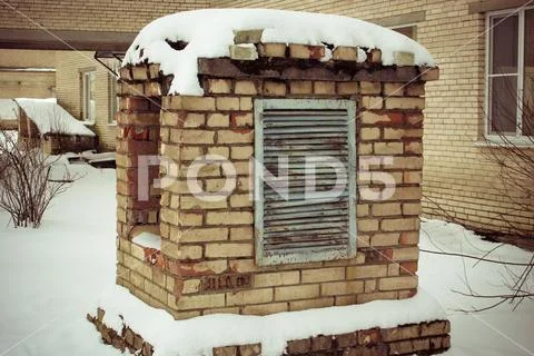 Old brick ventilation shaft at the hospital. The old ventilation system ...