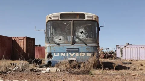 Old bus in the military tank graveyard, ... | Stock Video | Pond5