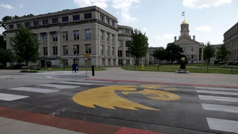 Old Capitol building and Hawkeye statue ... | Stock Video | Pond5