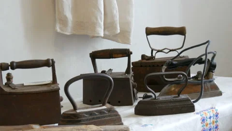 Old cast iron irons on display in the mu... | Stock Video | Pond5