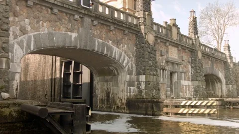 Old cobble stone bridge with a peaceful ... | Stock Video | Pond5